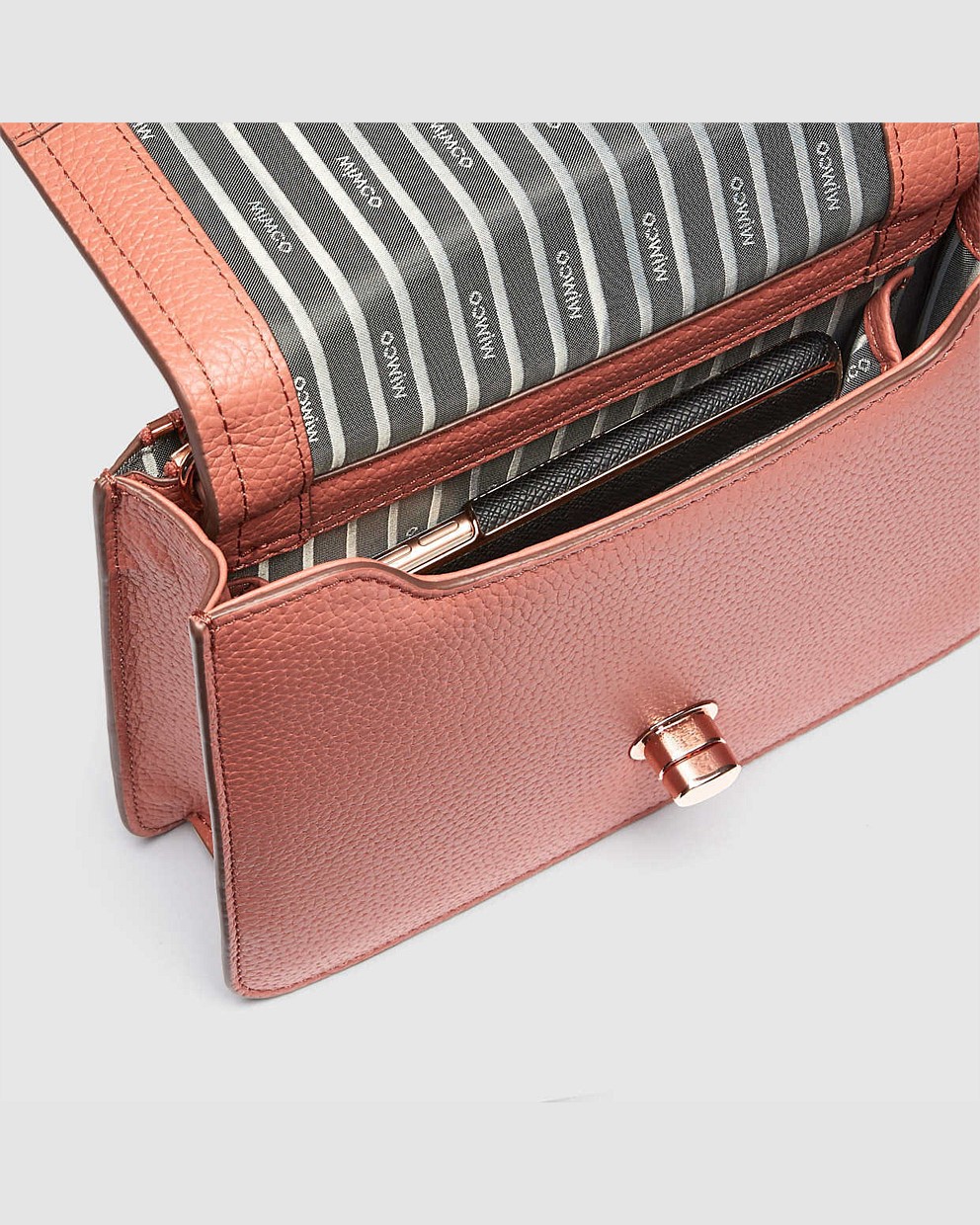 Peach Gin TURNLOCK SLING BAG - Crossbody Bags | Mimco