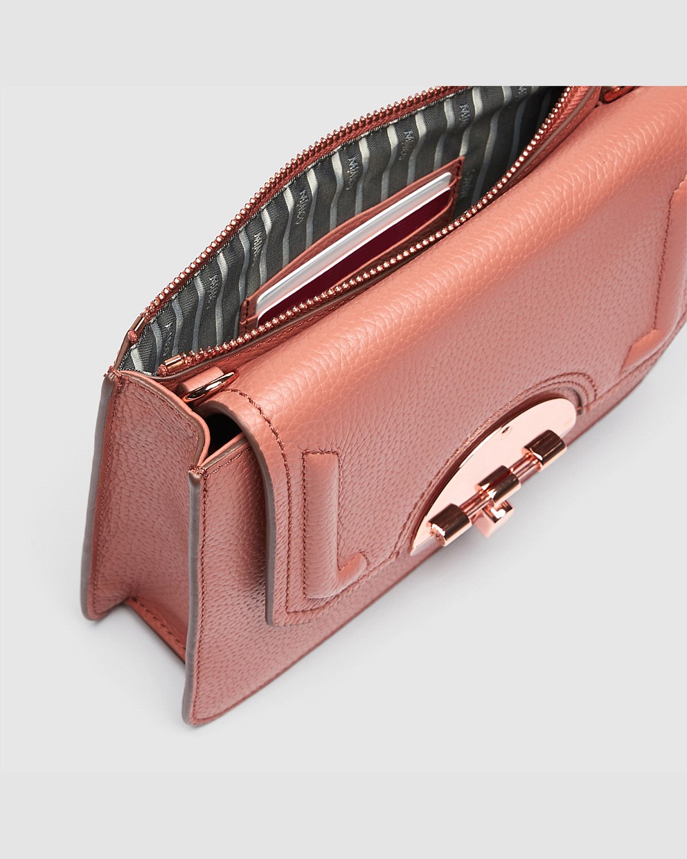 Peach Gin TURNLOCK SLING BAG - Crossbody Bags | Mimco