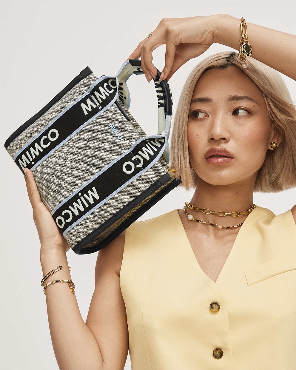 Black Light Gold Stevie Mini Tote Bag - Crossbody Bags | Mimco